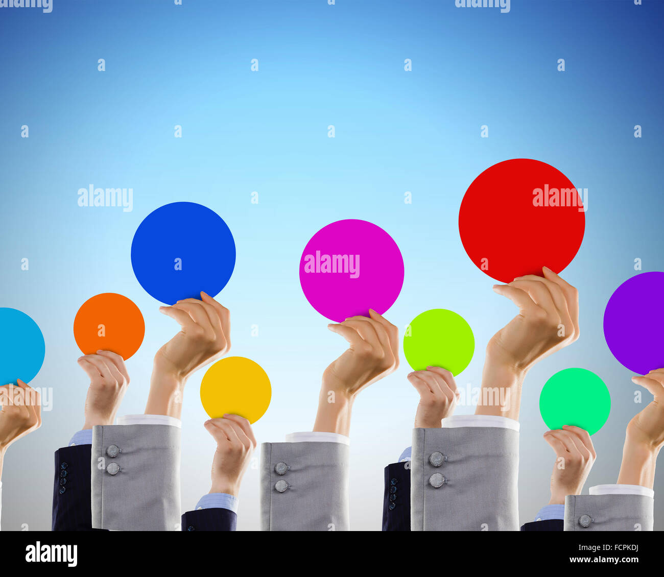 Crowd of businesspeople lifting up hands with conceptual cards Stock ...