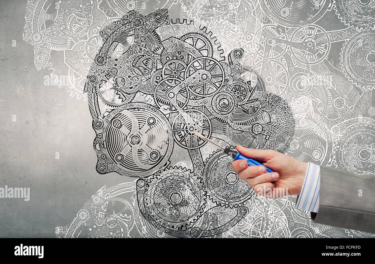 Close up of hand with screw fixing mechanism Stock Photo - Alamy