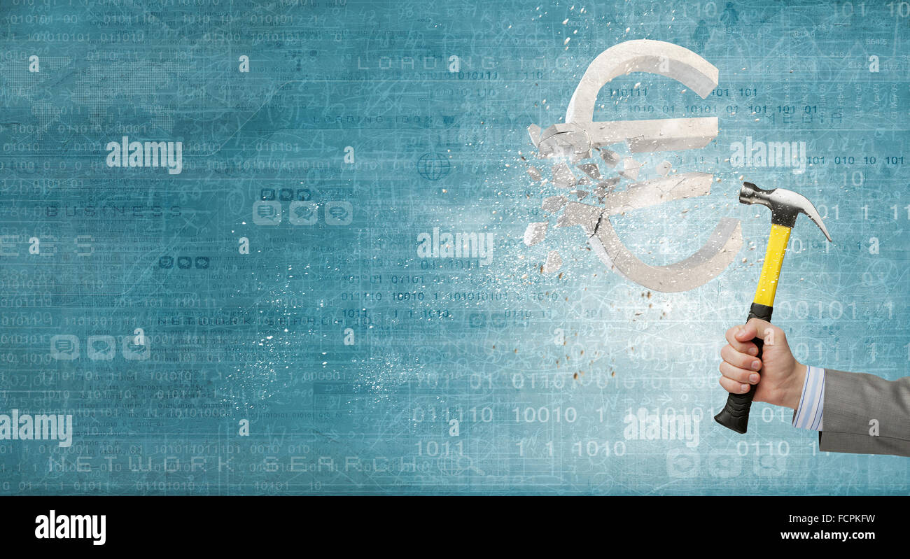 Close up of hammer in human hand breaking stone euro symbol Stock Photo ...
