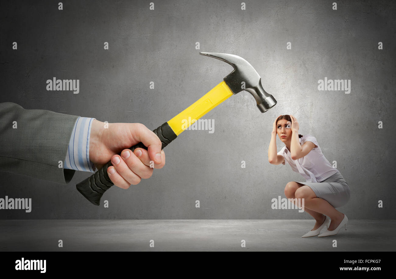 Close up of hammer in male hand attacking scared woman Stock Photo - Alamy