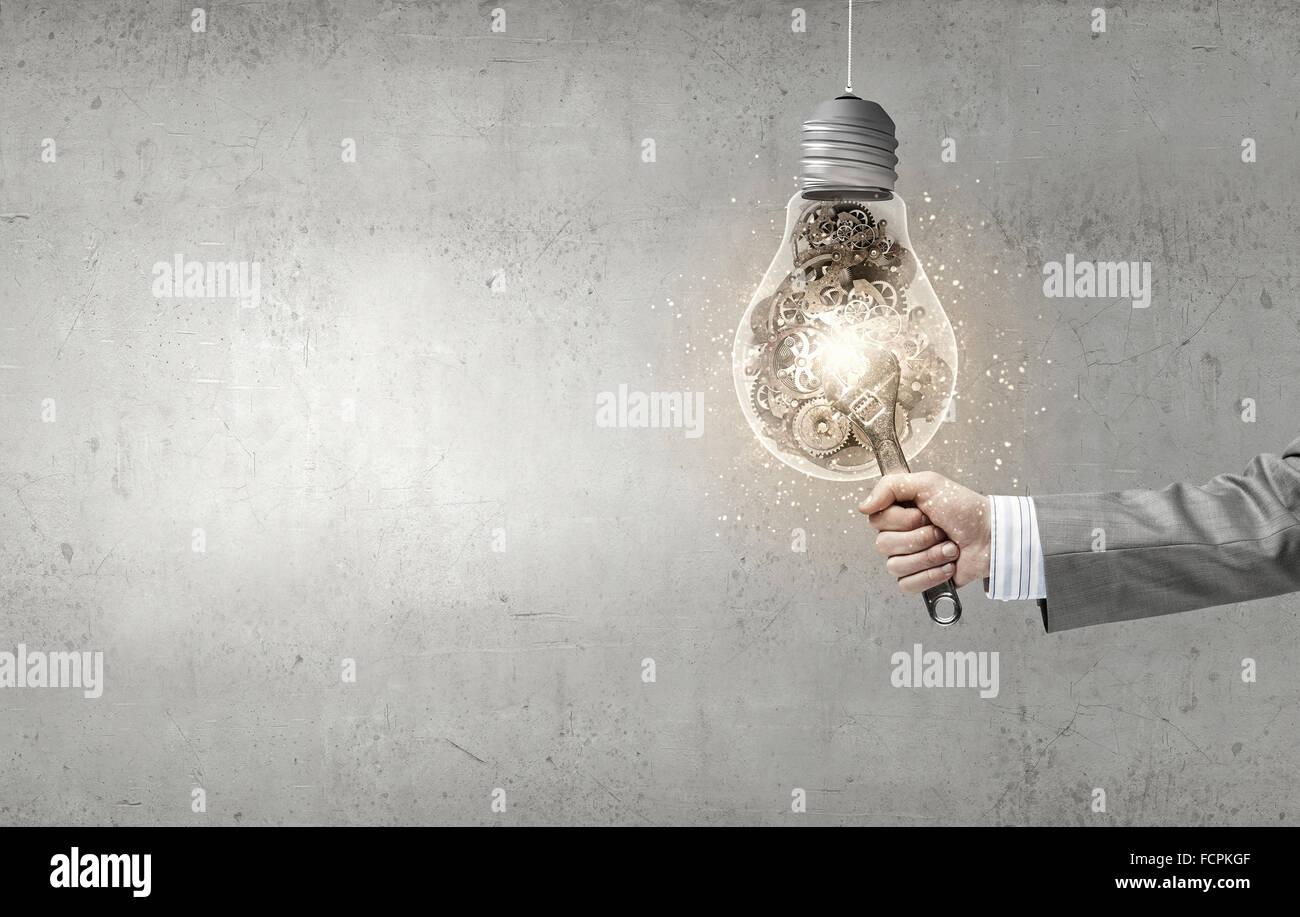 Close up of hand with wrench fixing mechanism Stock Photo - Alamy