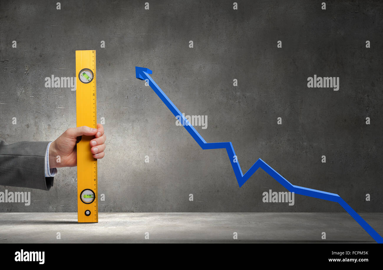 Close up of male hand measuring graph with ruler Stock Photo - Alamy