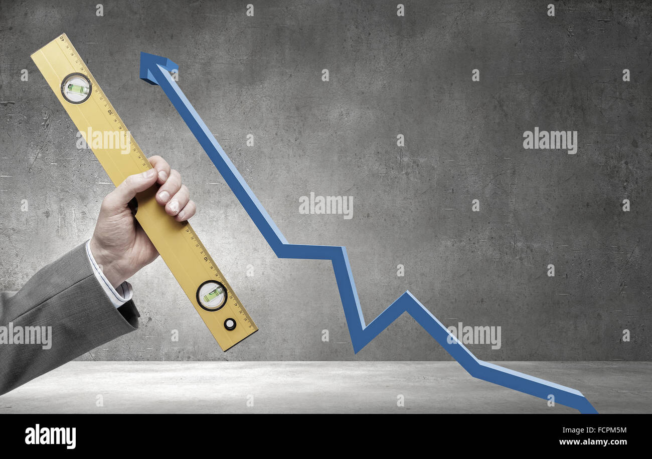 Close up of male hand measuring graph with ruler Stock Photo - Alamy