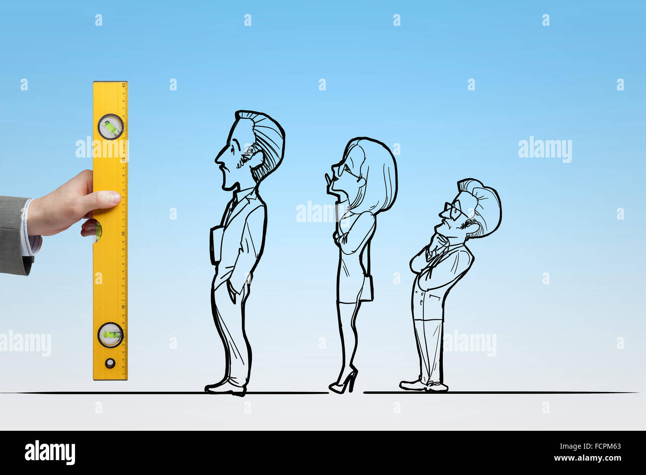 Hand measuring businessman success with wooden ruler Stock Photo - Alamy