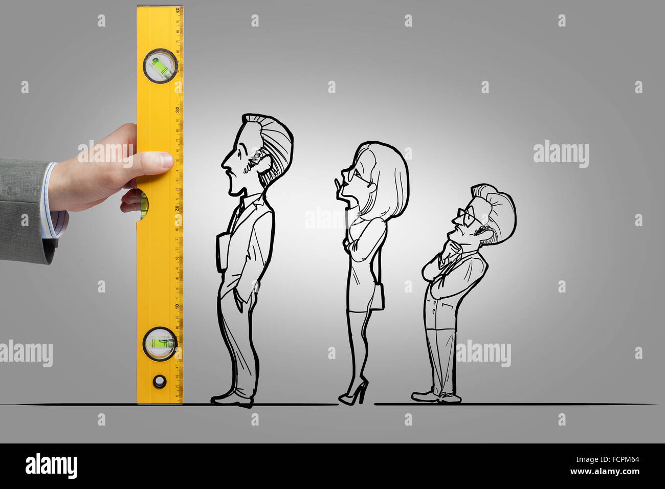 Hand measuring businessman success with wooden ruler Stock Photo - Alamy