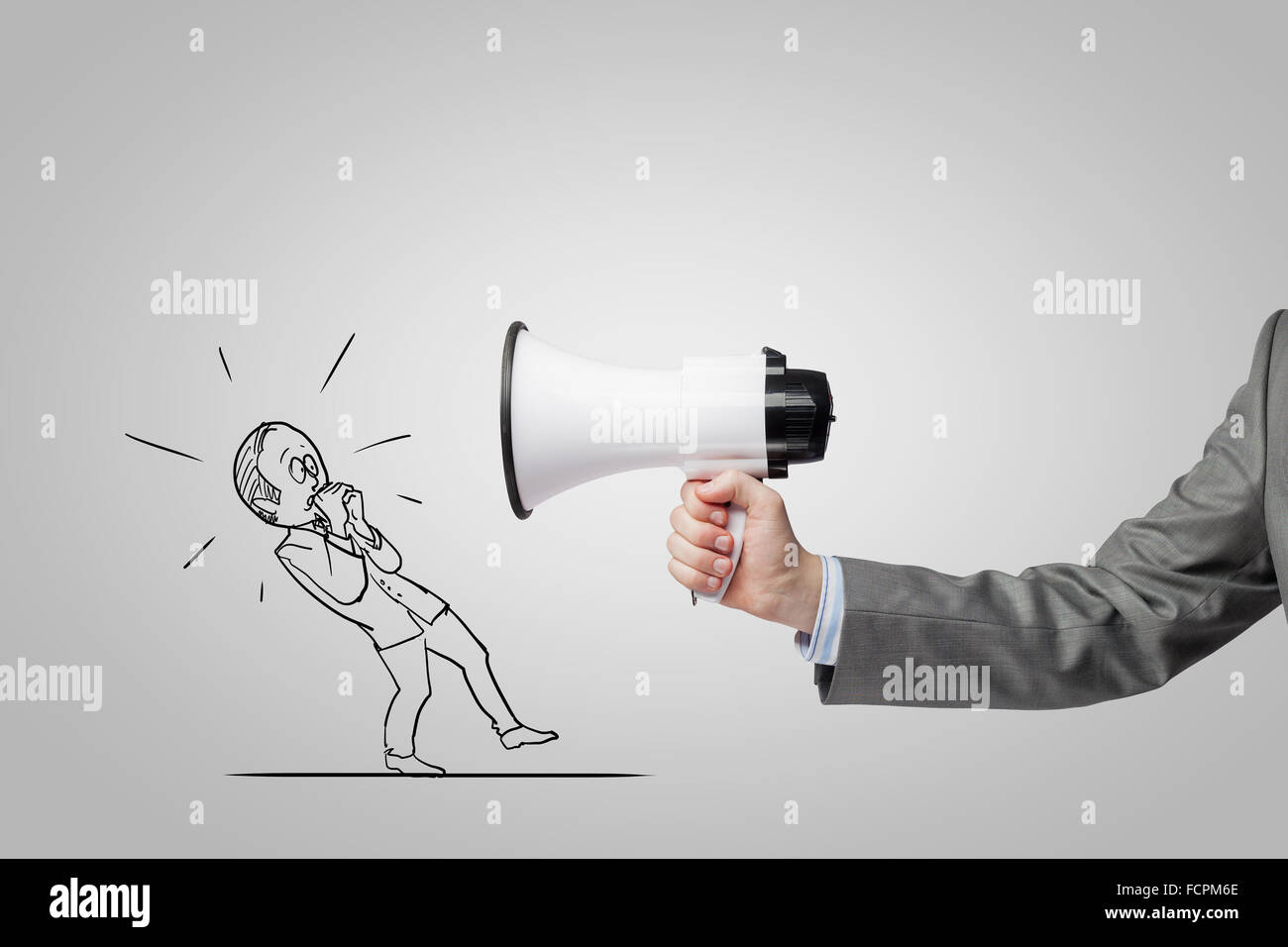Boss using megaphone yelling at his employee Stock Photo - Alamy