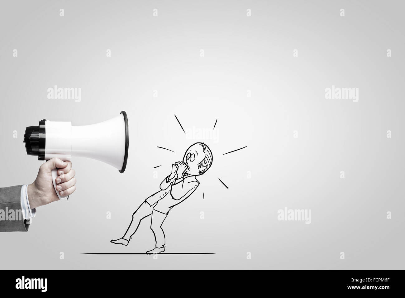 Boss using megaphone yelling at his employee Stock Photo - Alamy