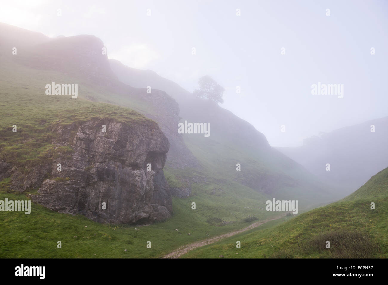 A misty autumn morning in Cavedale, Castleton in the Peak DIstrict ...
