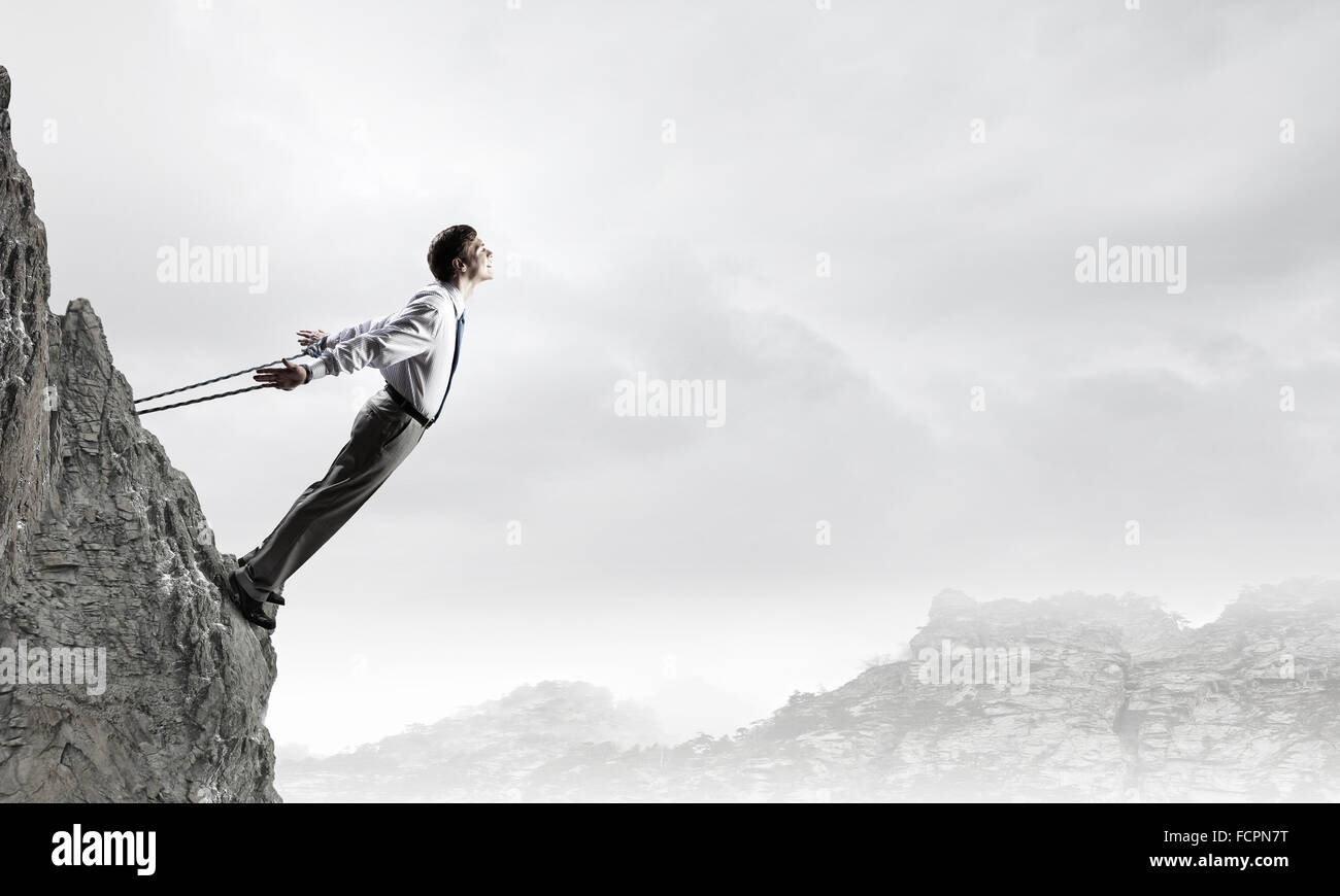 Businessman struggling with problems that occur on the way Stock Photo ...