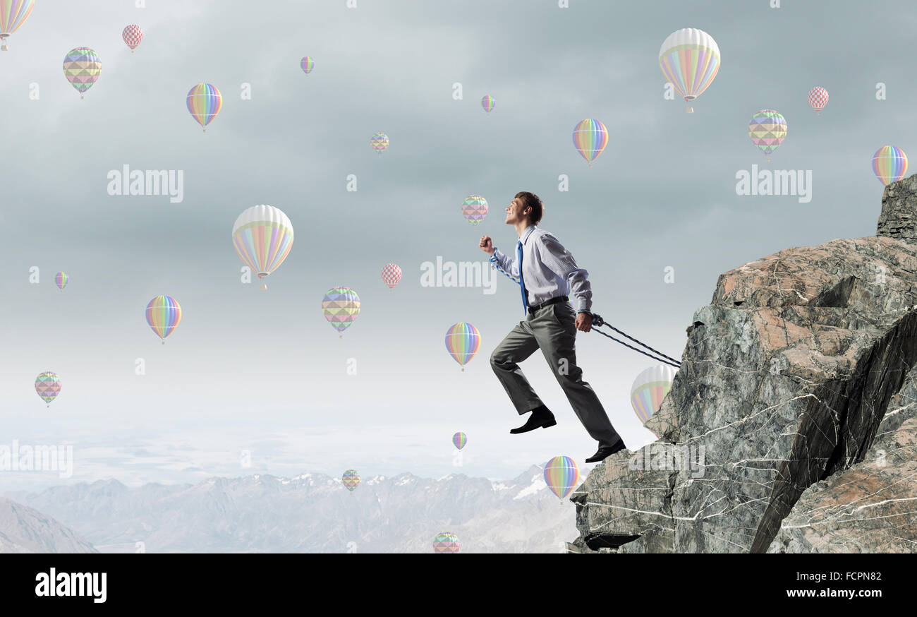 Businessman struggling with problems that occur on the way Stock Photo ...