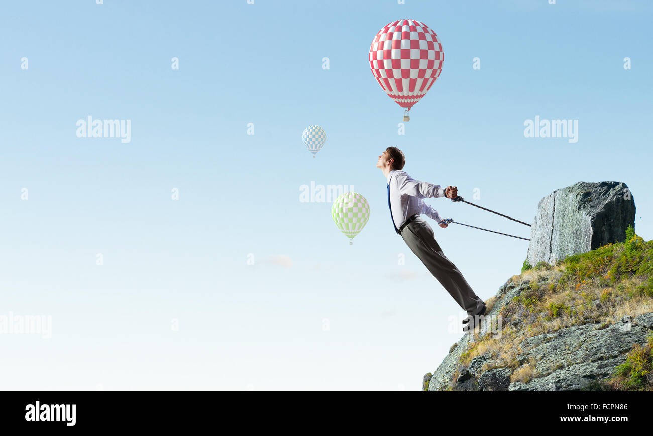 Businessman struggling with problems that occur on the way Stock Photo ...