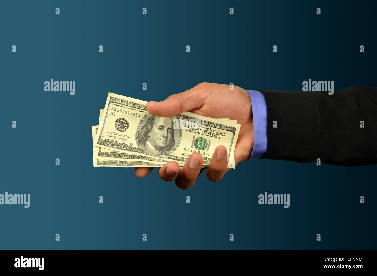 business man holding money in hand Stock Photo - Alamy
