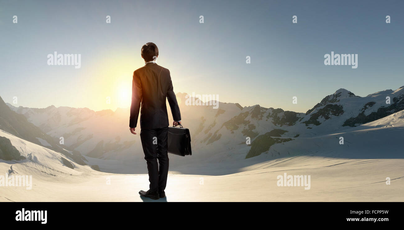 Rear view businessman look sunrise hi-res stock photography and images ...