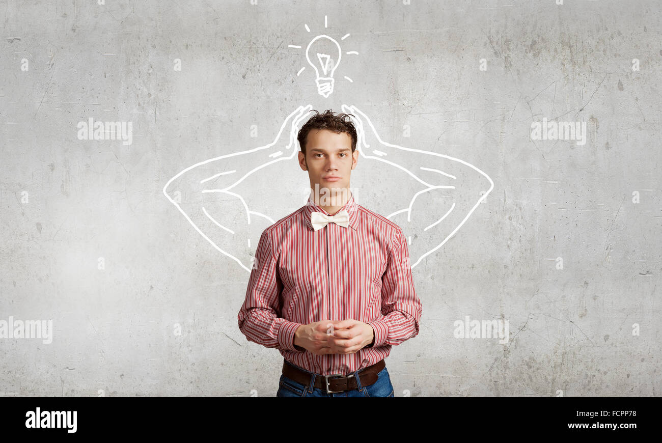 Young man with drawn strong hands behind back Stock Photo - Alamy