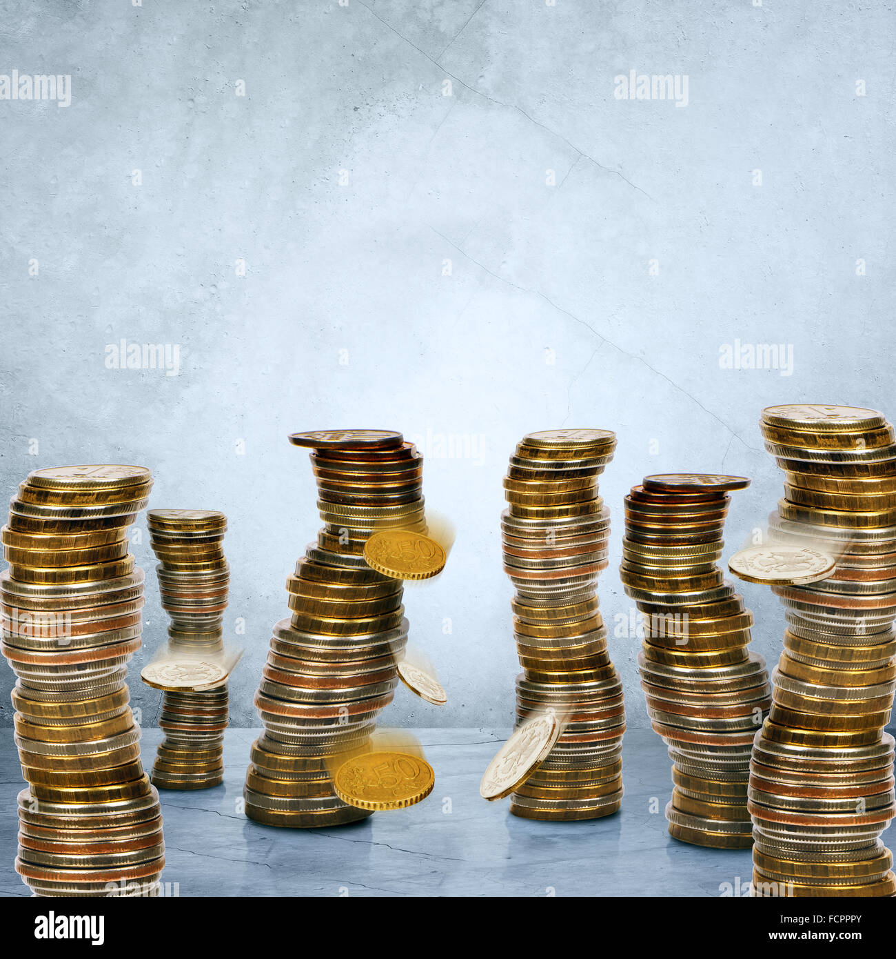 Falling stack of coins Stock Photo - Alamy