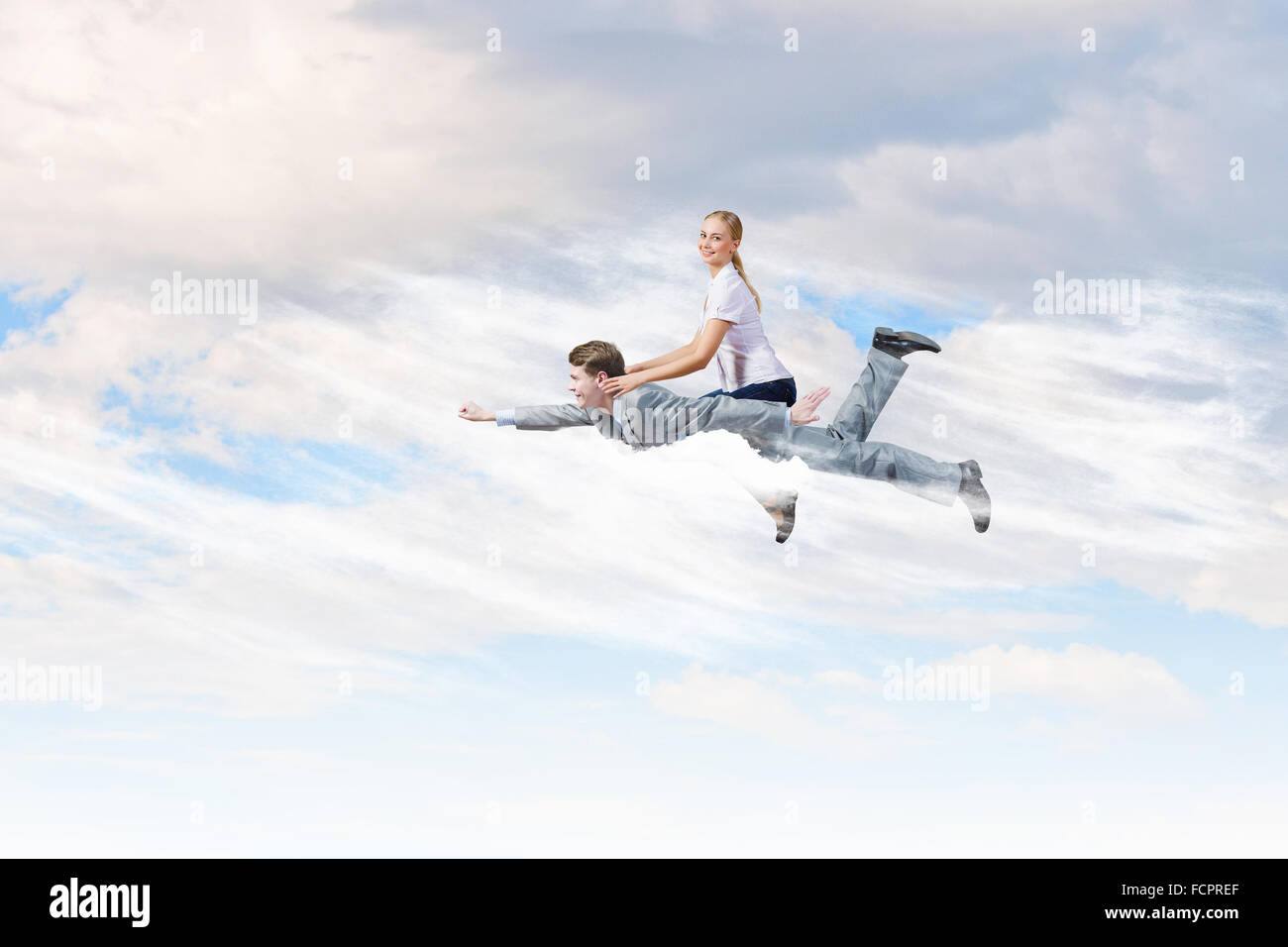 Young girl riding on back of her man Stock Photo - Alamy