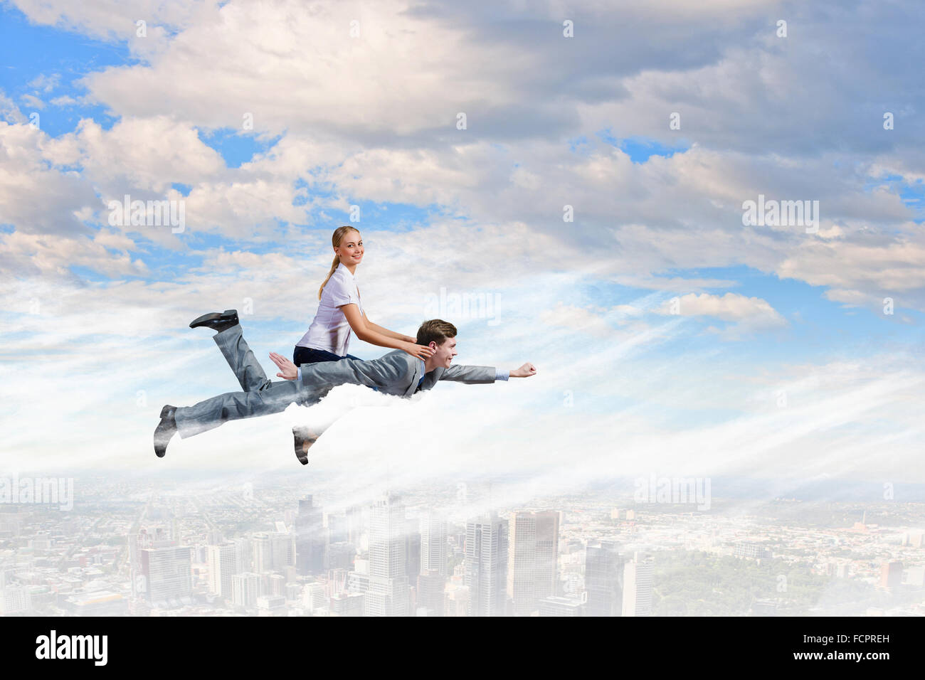 Young girl riding on back of her man Stock Photo - Alamy