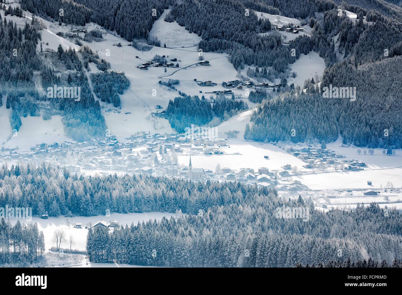 Wintery village in alpine valley, Tyrol, Austria Stock Photo - Alamy