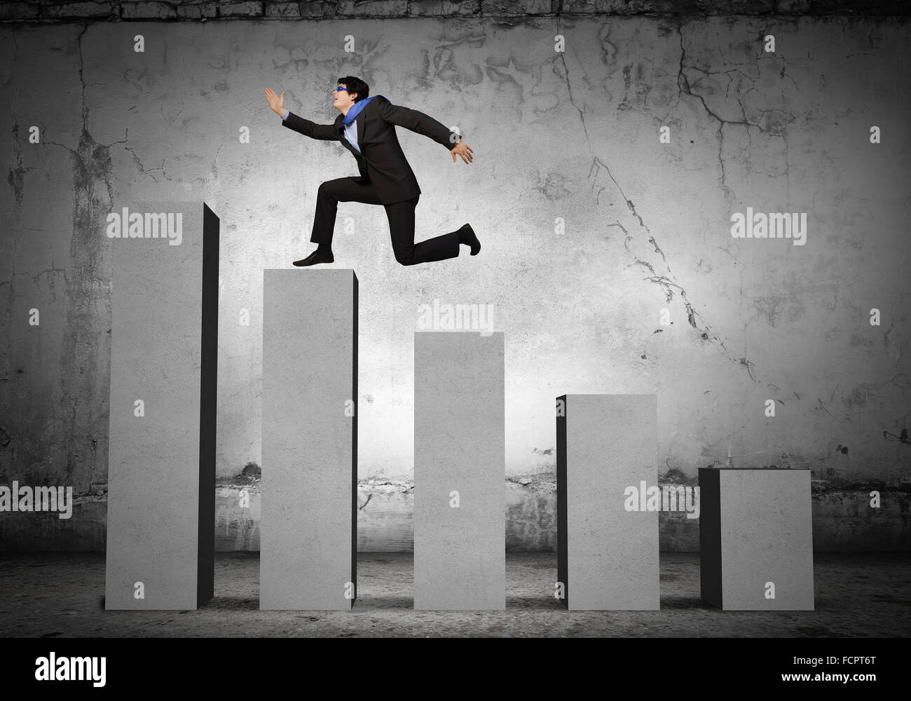 Young businessman stepping up on chart bar Stock Photo - Alamy