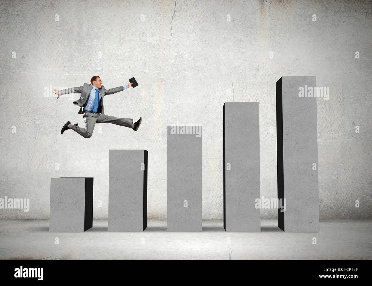 Young businessman stepping up on chart bar Stock Photo - Alamy