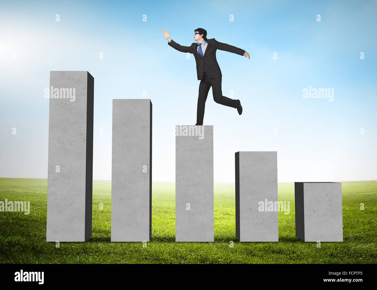 Young businessman stepping up on chart bar Stock Photo - Alamy
