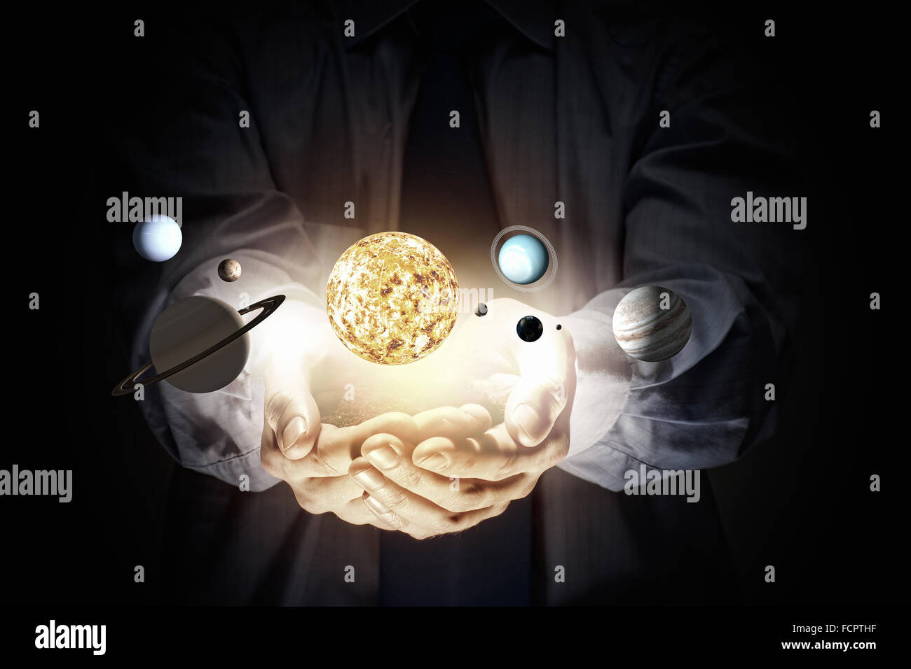 Close up of planet sun system in your hand Stock Photo - Alamy