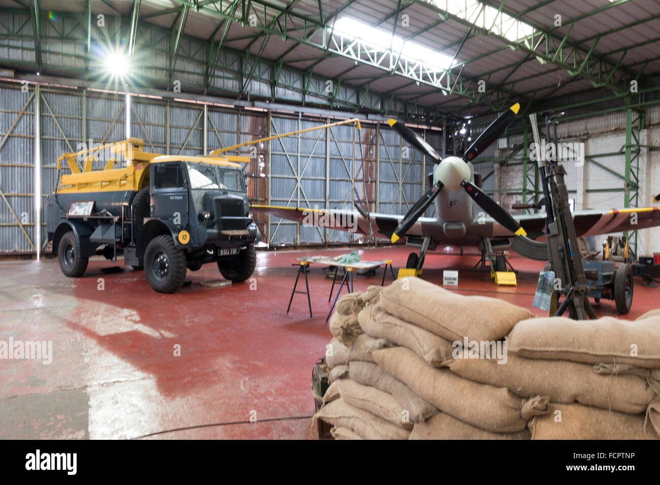 A recreated scene from world war two of an active Spitfire hangar as ...