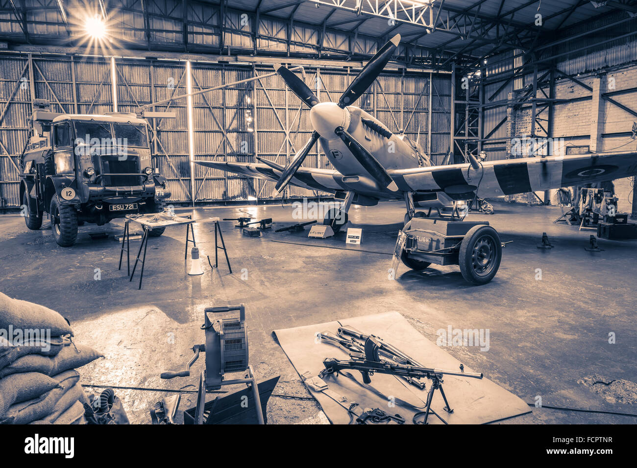 A recreated scene from world war two of an active Spitfire hangar as the aircraft is refuelled ...