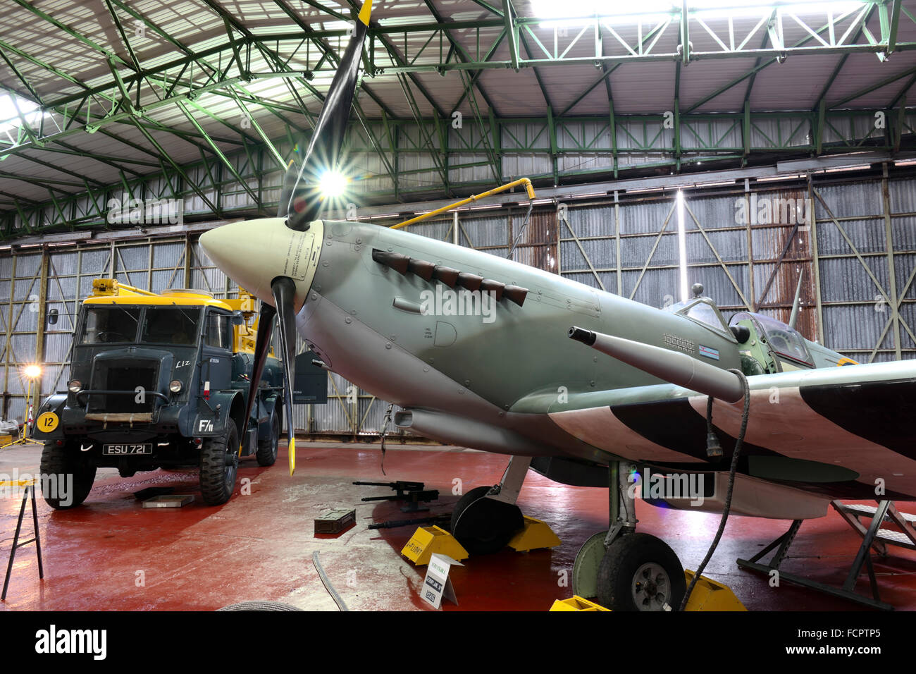 A recreated scene from world war two of an active Spitfire hangar as ...