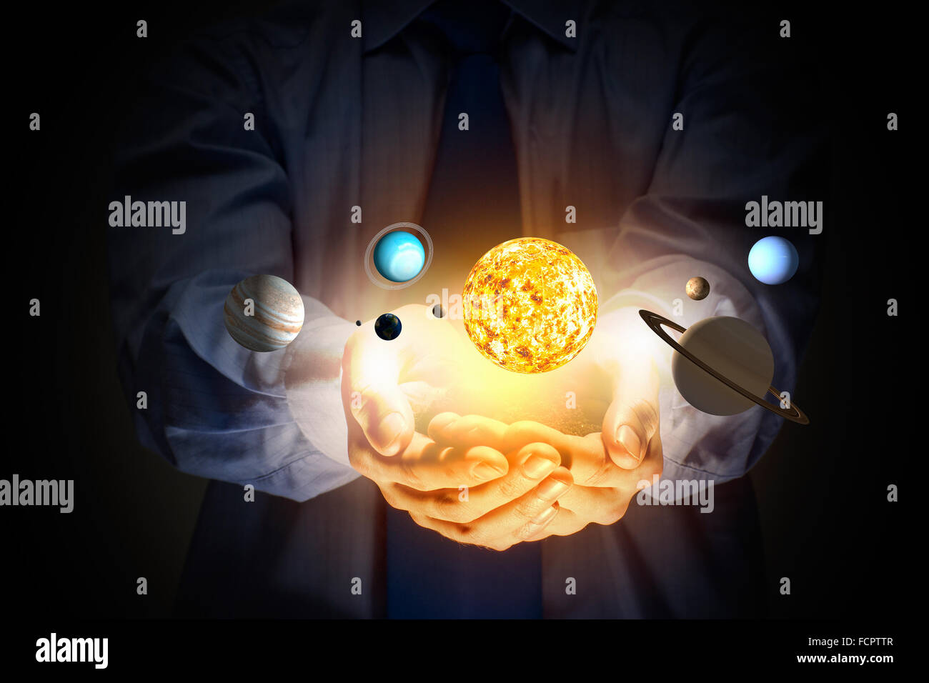 Close up of planet sun system in your hand Stock Photo - Alamy