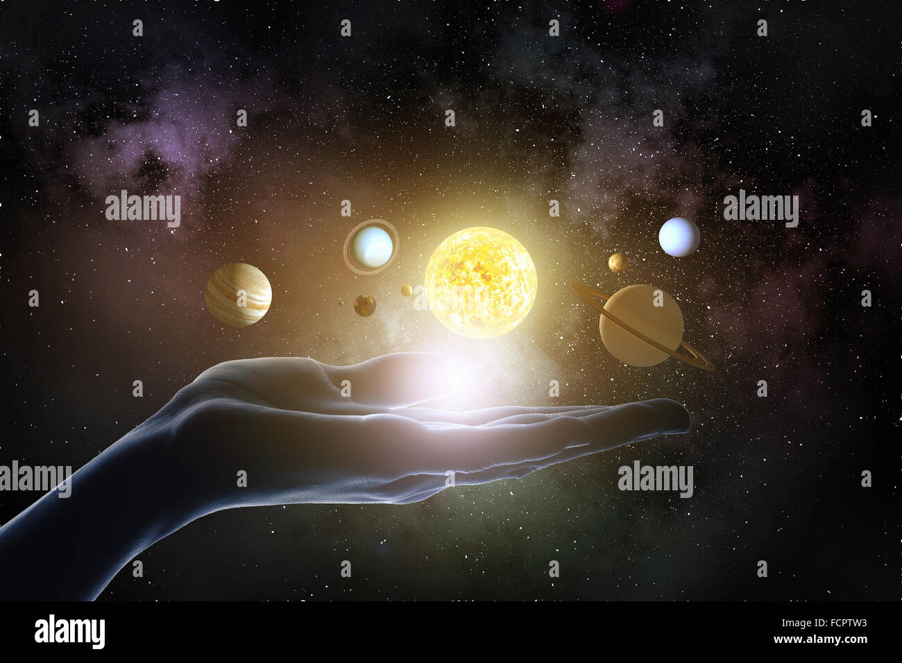 Close up of planet sun system in your hand Stock Photo - Alamy