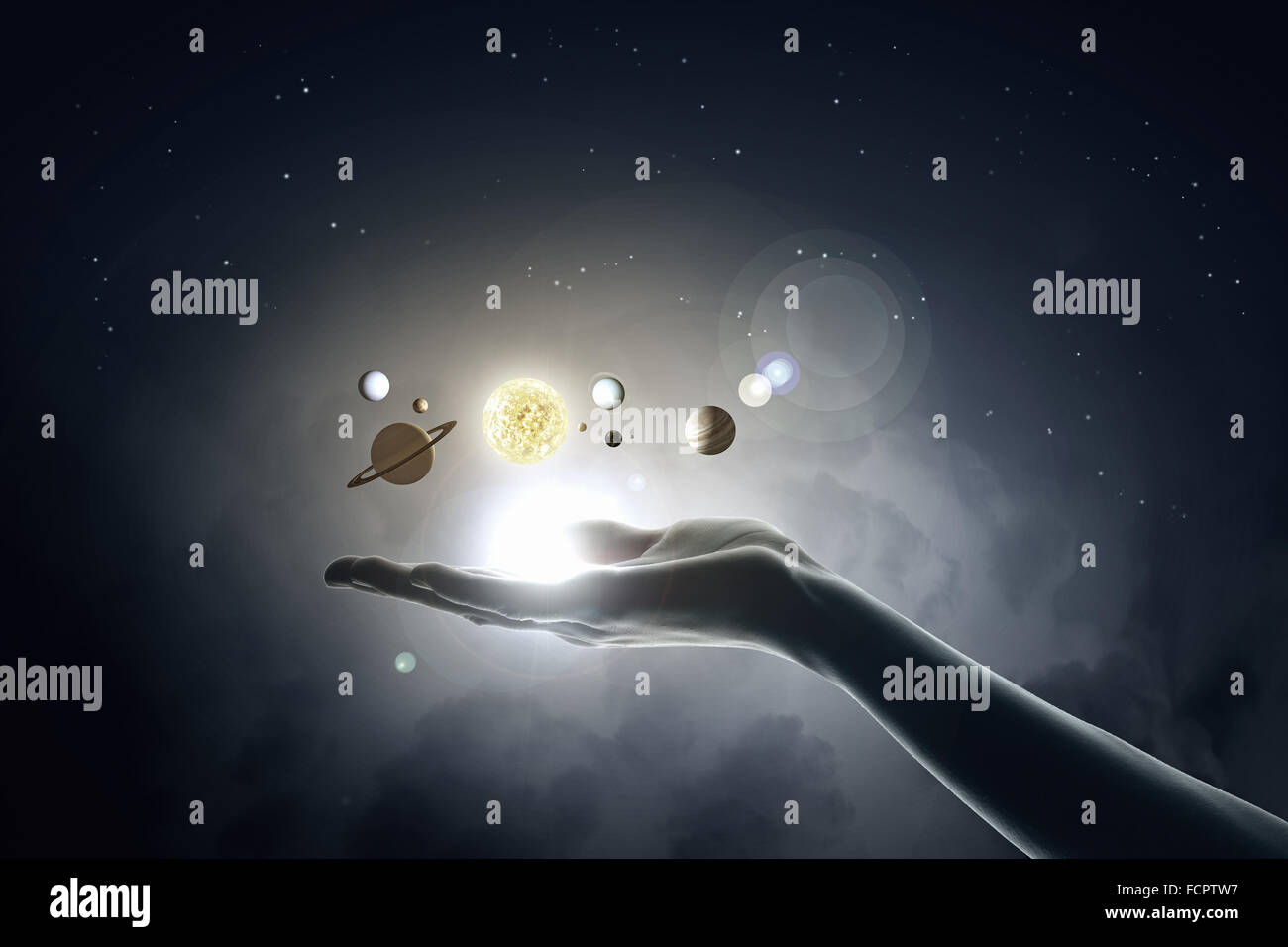 Close up of planet sun system in your hand Stock Photo - Alamy