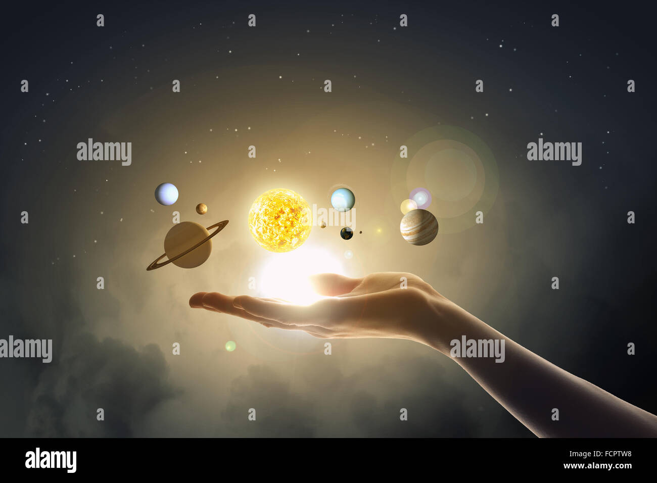 Close up of planet sun system in your hand Stock Photo - Alamy