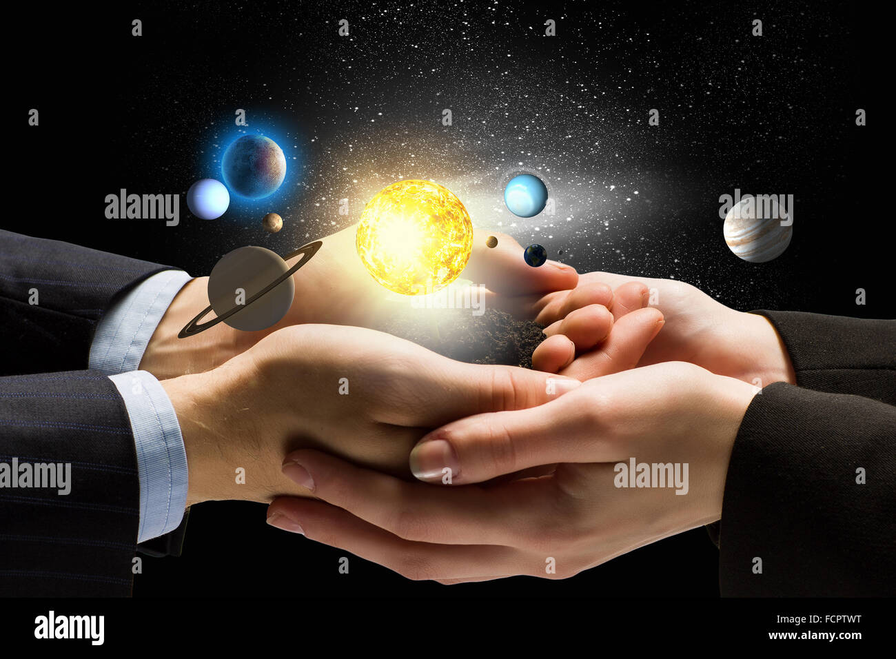 Close up of planet sun system in your hand Stock Photo - Alamy