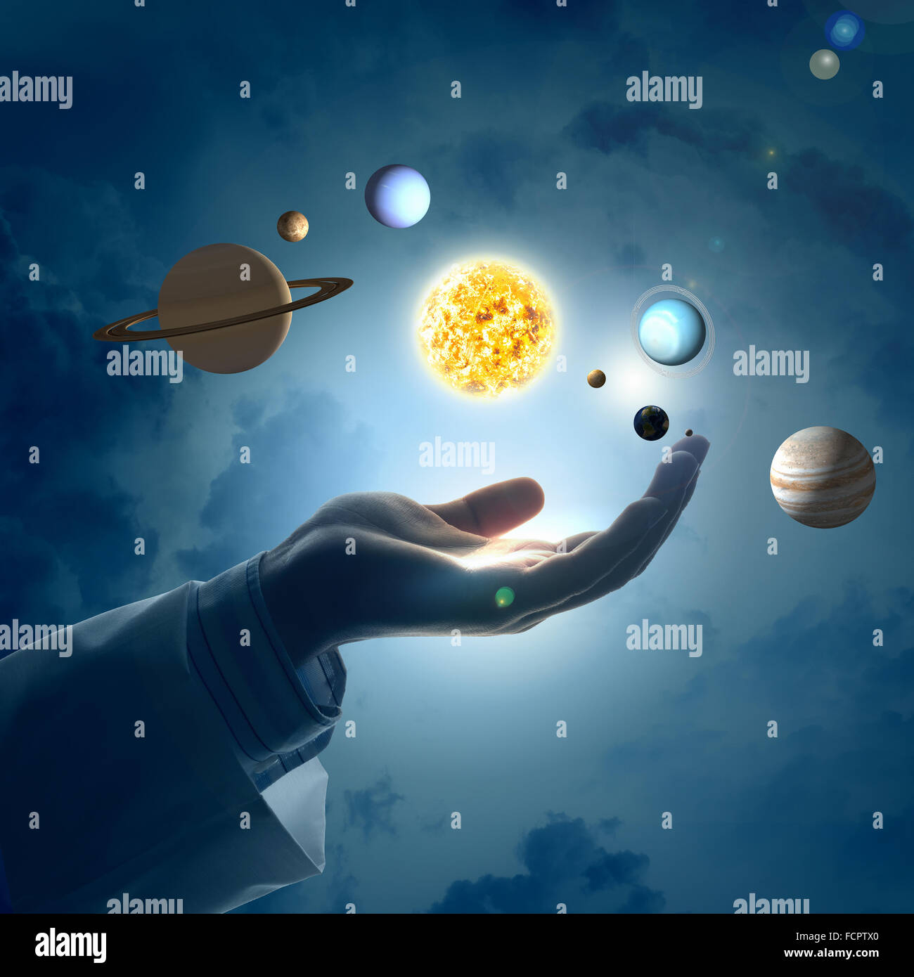 Close up of planet sun system in your hand Stock Photo - Alamy