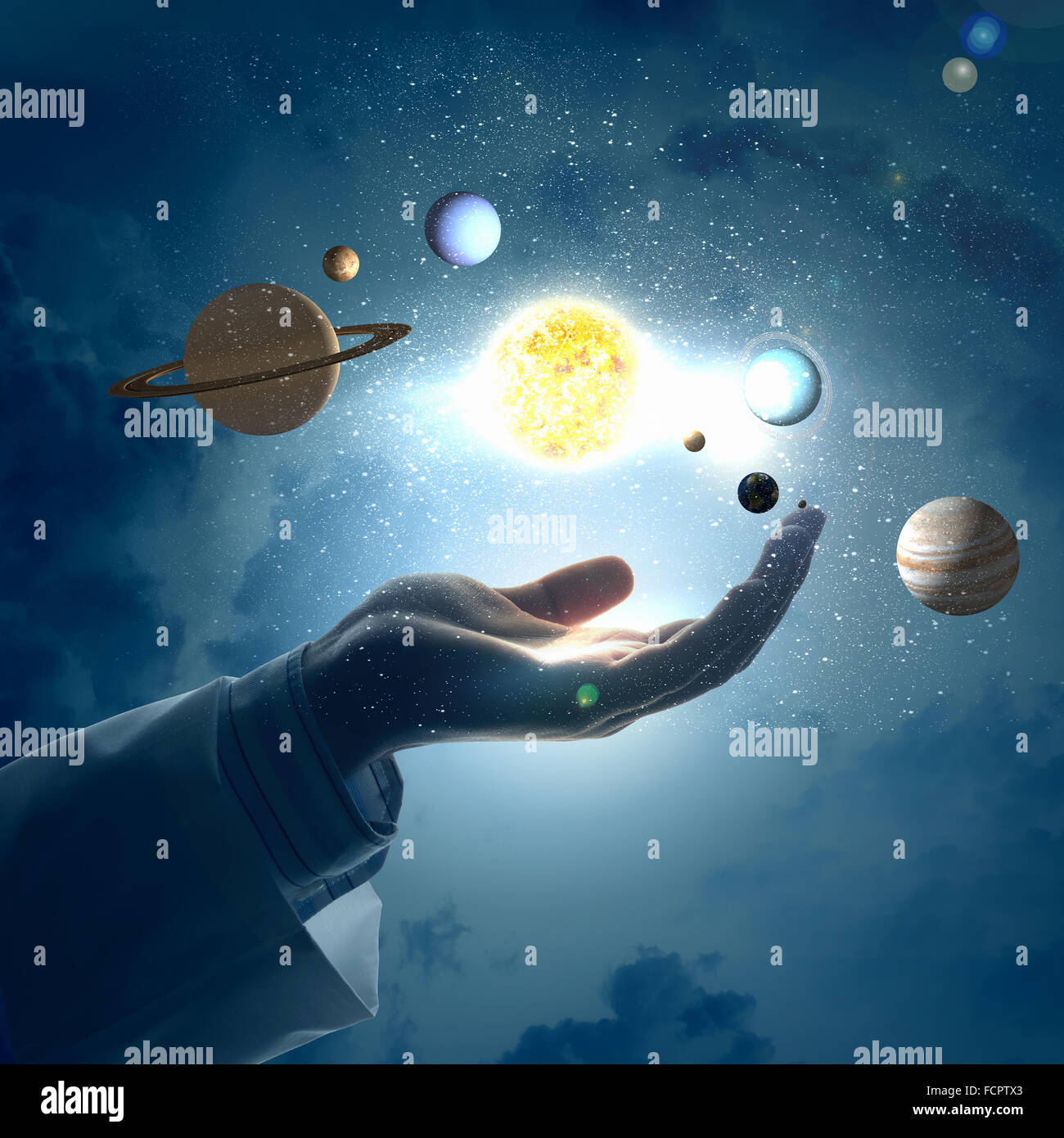 Close up of planet sun system in your hand Stock Photo - Alamy
