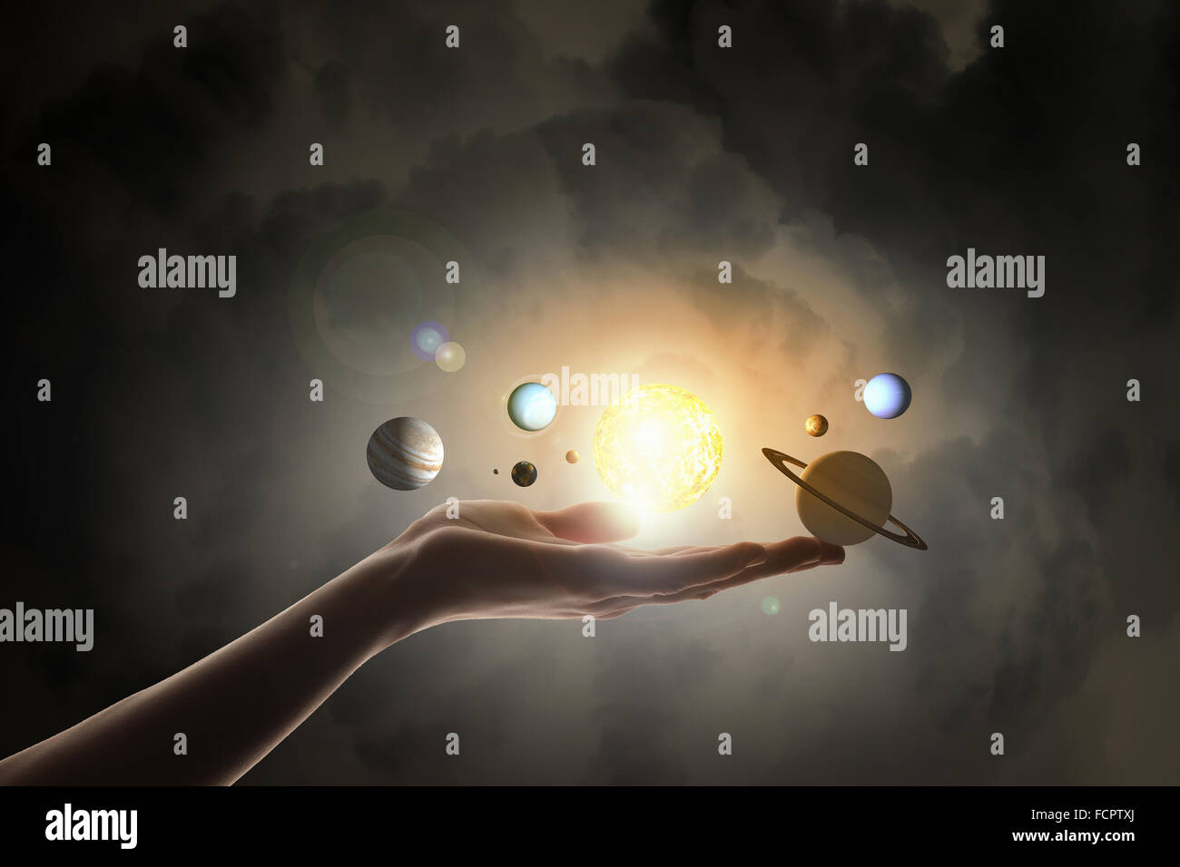 Close up of planet sun system in your hand Stock Photo - Alamy