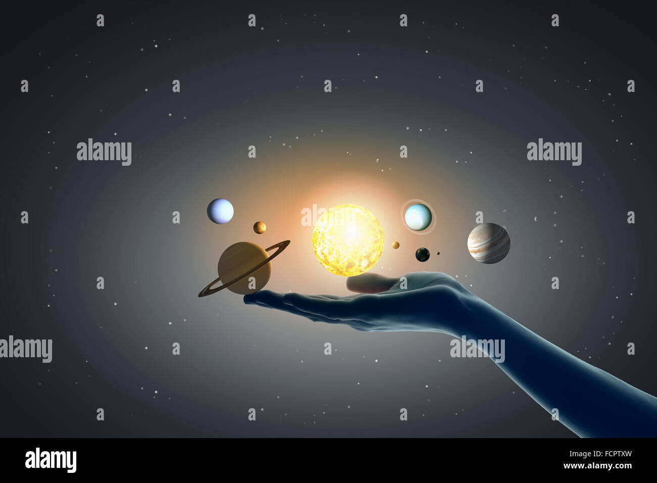 Close up of planet sun system in your hand Stock Photo - Alamy