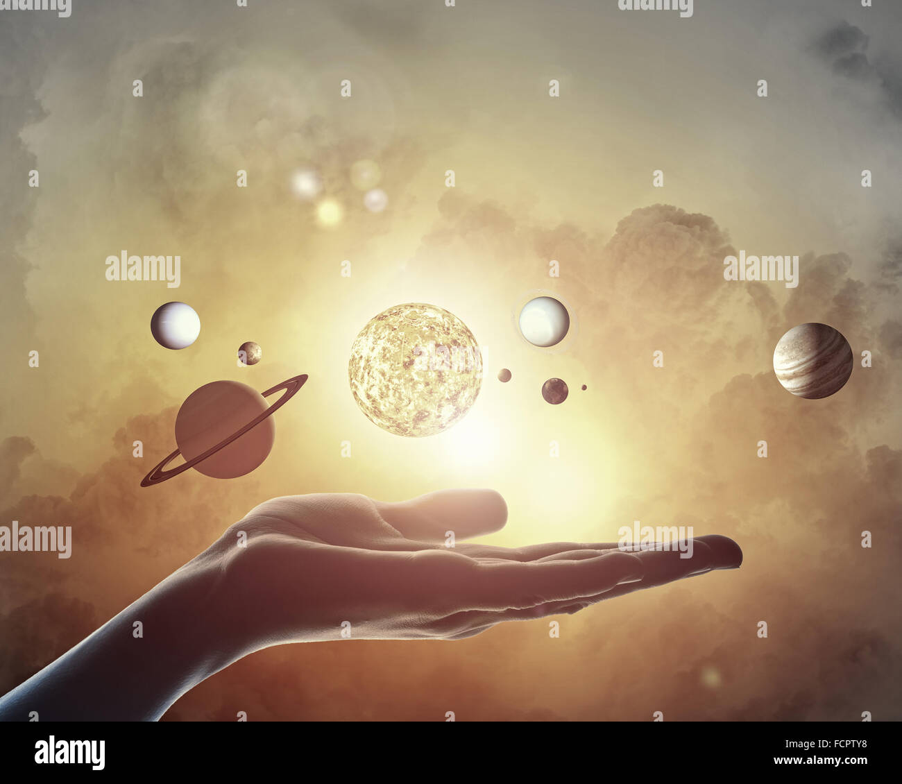 Close up of planet sun system in your hand Stock Photo - Alamy