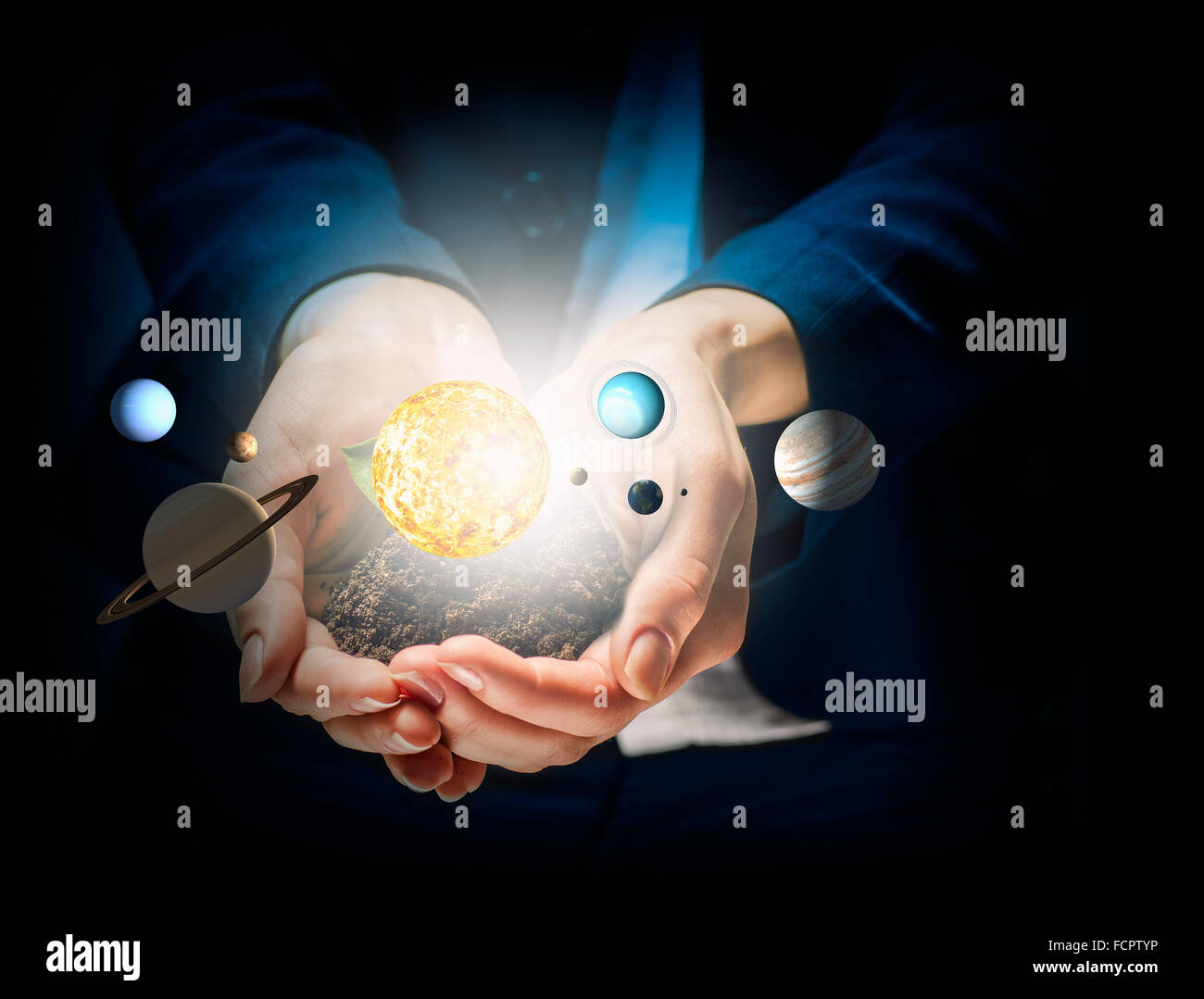 Close up of planet sun system in your hand Stock Photo - Alamy