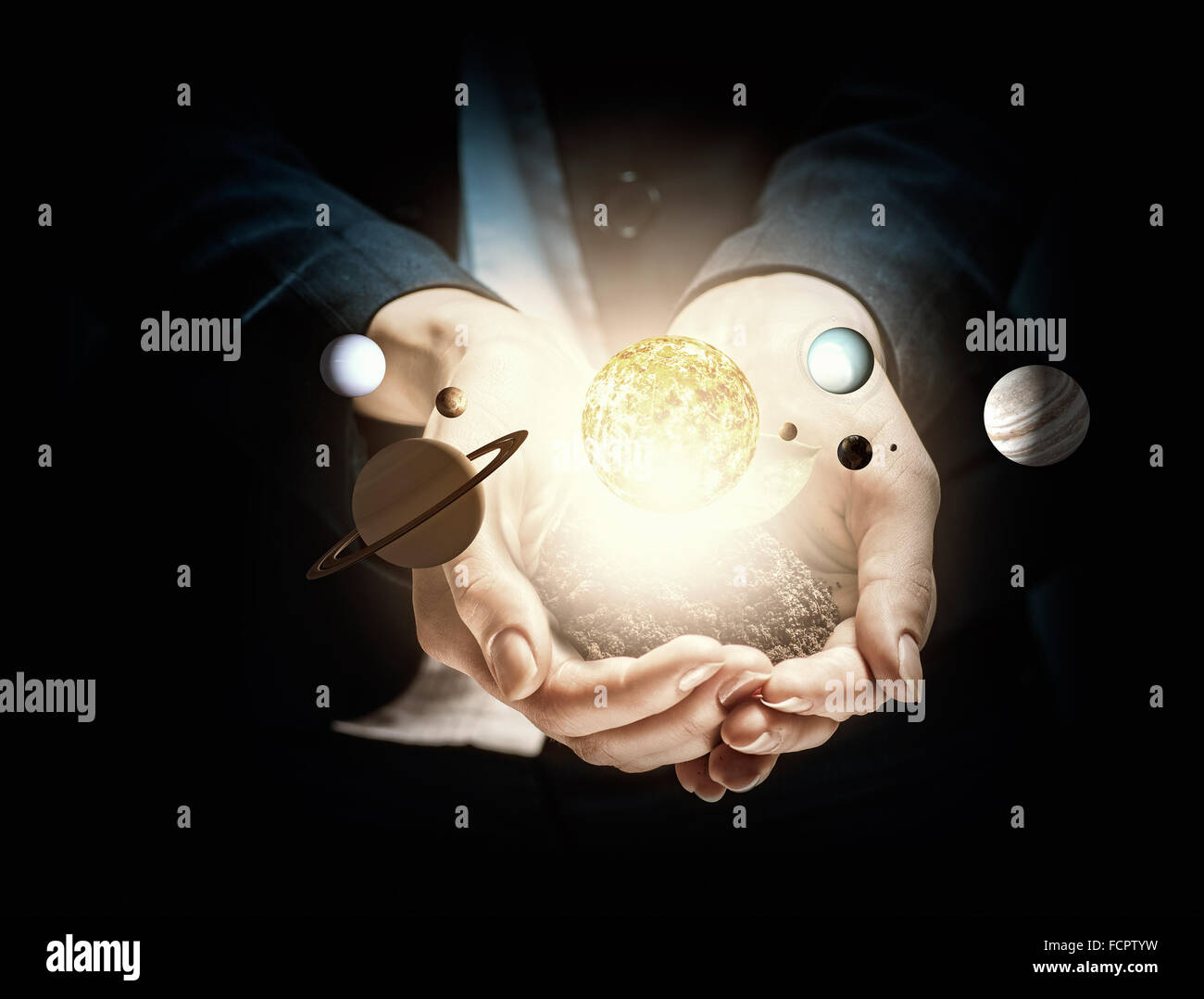 Close up of planet sun system in your hand Stock Photo - Alamy