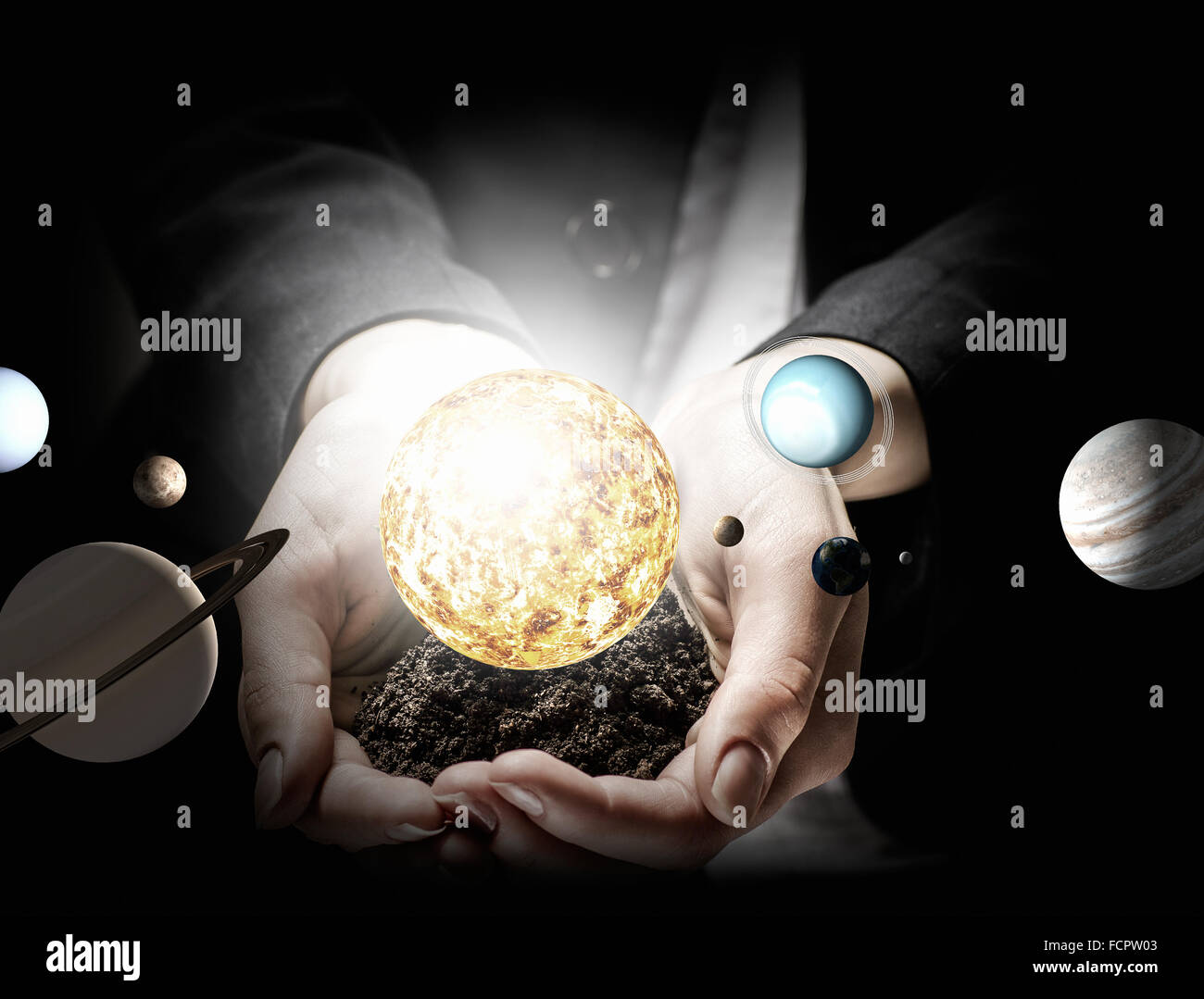 Close up of planet sun system in your hand Stock Photo - Alamy