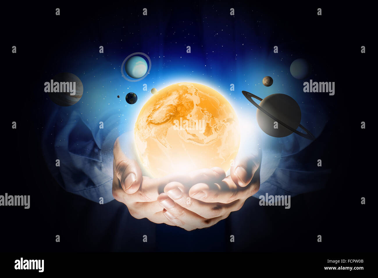 Close up of planet sun system in your hand Stock Photo - Alamy