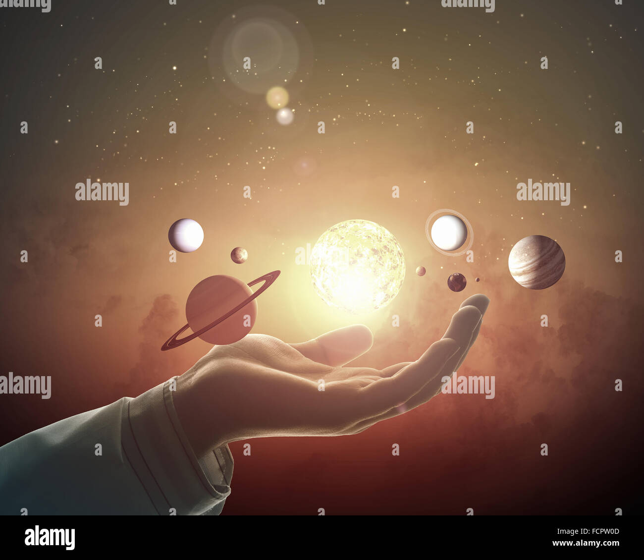Close up of planet sun system in your hand Stock Photo - Alamy