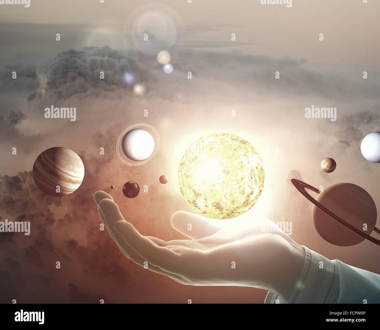 Close up of planet sun system in your hand Stock Photo - Alamy