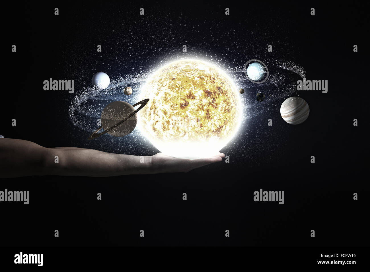 Close up of planet sun system in your hand Stock Photo - Alamy