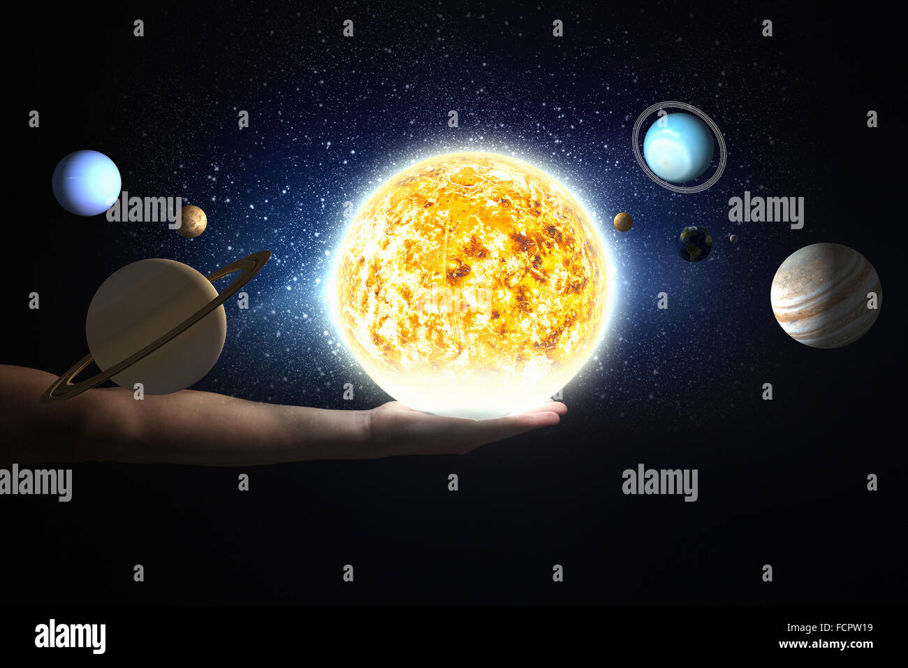 Close up of planet sun system in your hand Stock Photo - Alamy