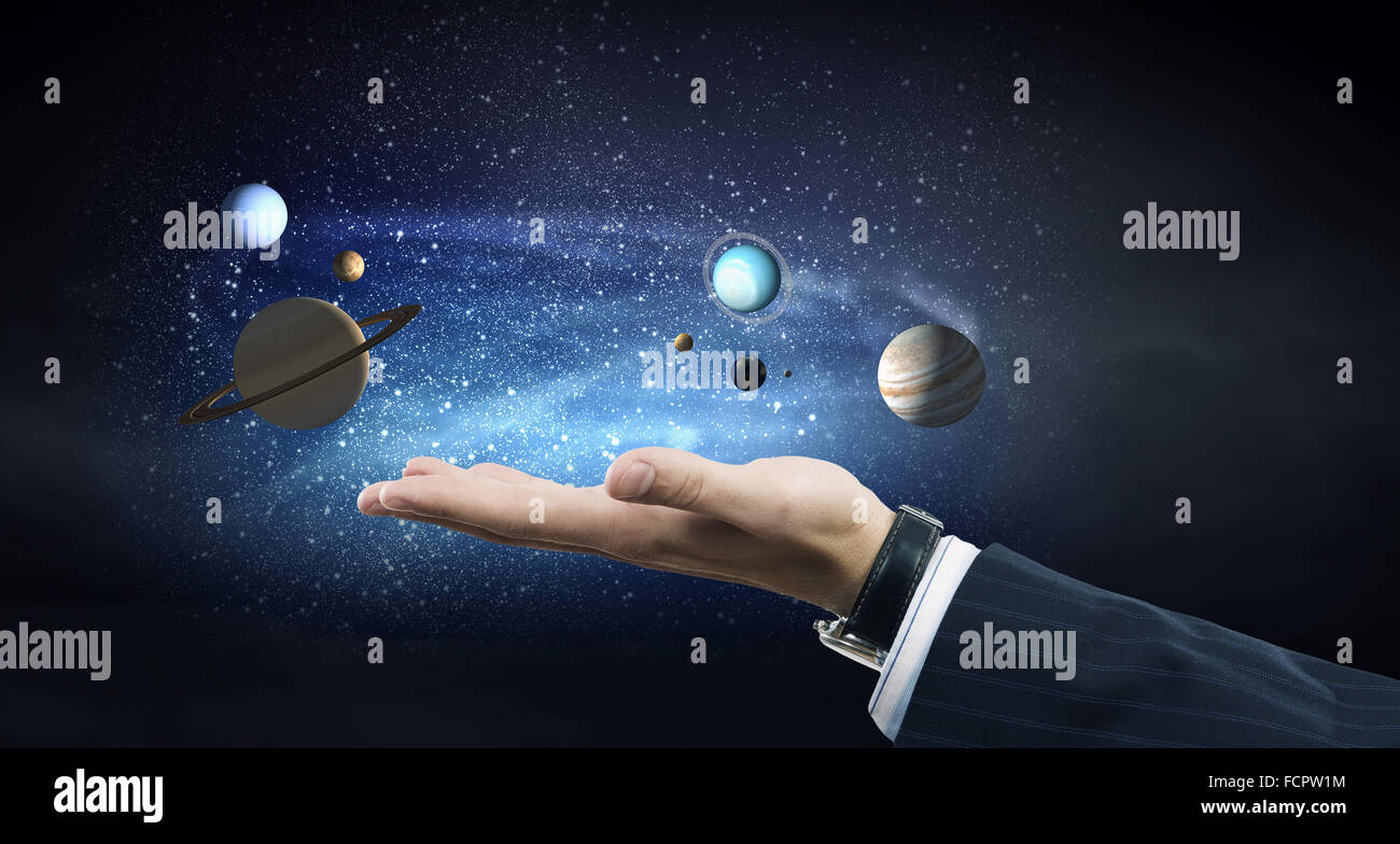 Close up of planet sun system in your hand Stock Photo - Alamy
