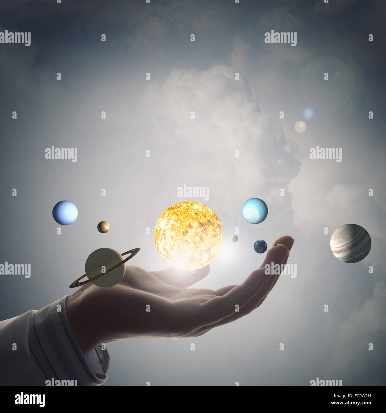 Close up of planet sun system in your hand Stock Photo - Alamy