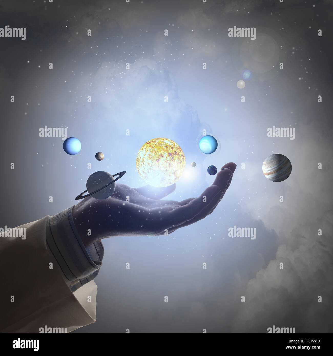 Close up of planet sun system in your hand Stock Photo - Alamy